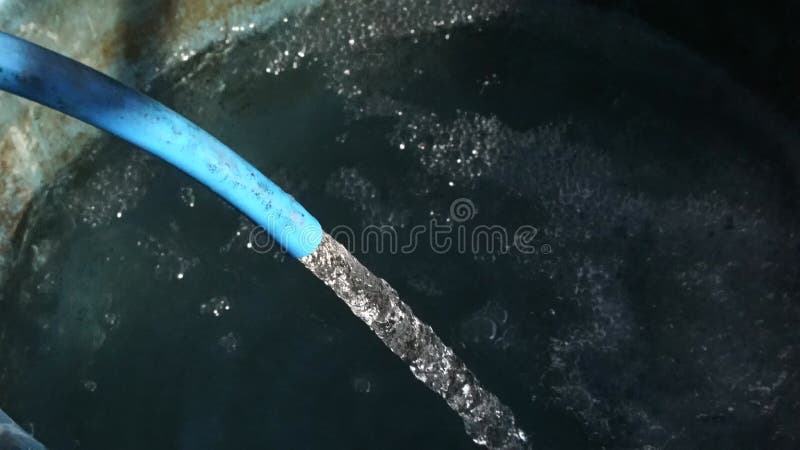 Water from the Tap Flows through a Blue Hose. Stock Video - Video of ...