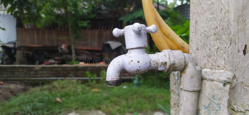 The Water Tap in Front of the House is in Poor Condition Stock Image ...