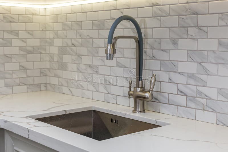 A Water Tap and a Rectangular Sink in the Kitchen Room. Stock Image ...