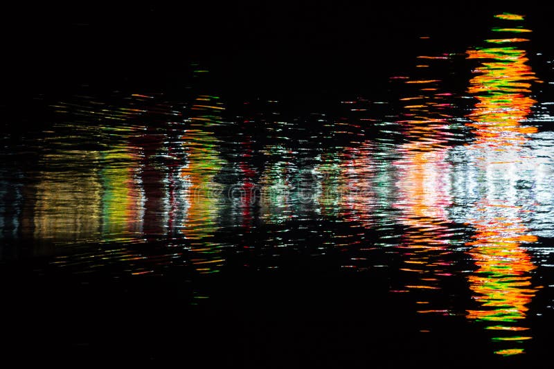 Water Texture with Color Reflections on a Black Background Stock Image ...