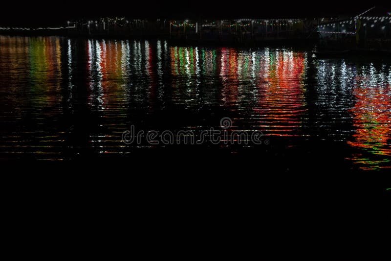 Water Texture with Color Reflections on a Black Background Stock Image ...