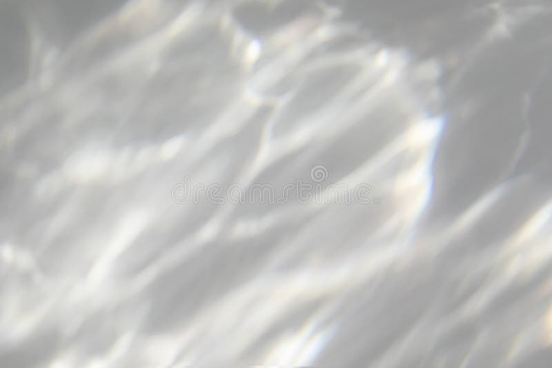Shadow and Light Caustic Effect on a White Wall Stock Image - Image of ...