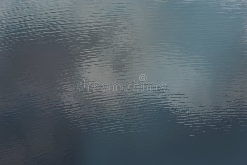 Water Texture with Reflection in the River. Reflection on the Water ...