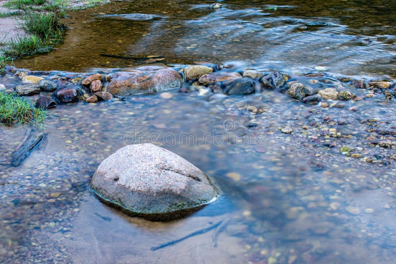 Water Texture with Reflections and Rocks on the Bottom of Stream Stock ...