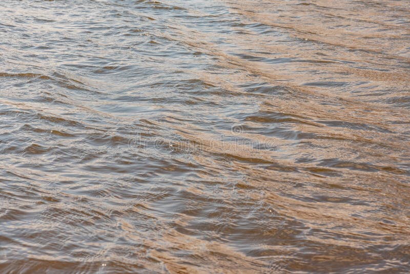 Water Texture, Small Waves. Background. Glare and Reflective Surface ...