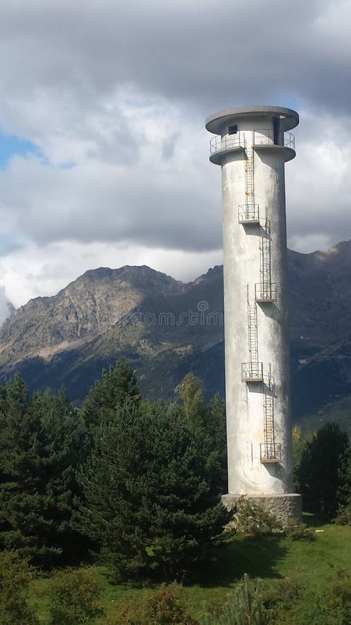 Water Tower in a Green Hill Stock Photo - Image of tower, ruined: 78701924