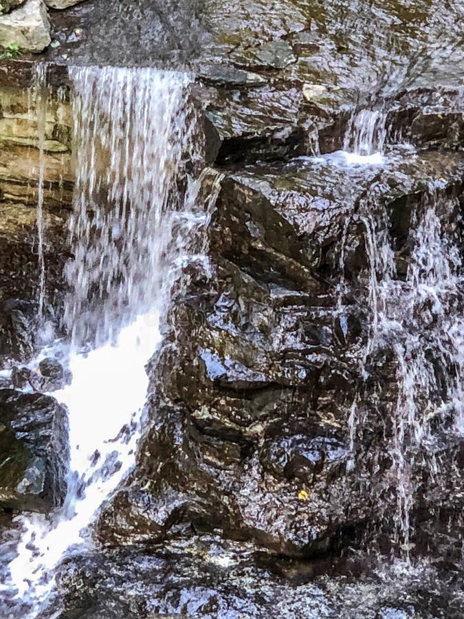 Water Trickling Down Rocks Creating Waterfall Stock Image - Image of ...