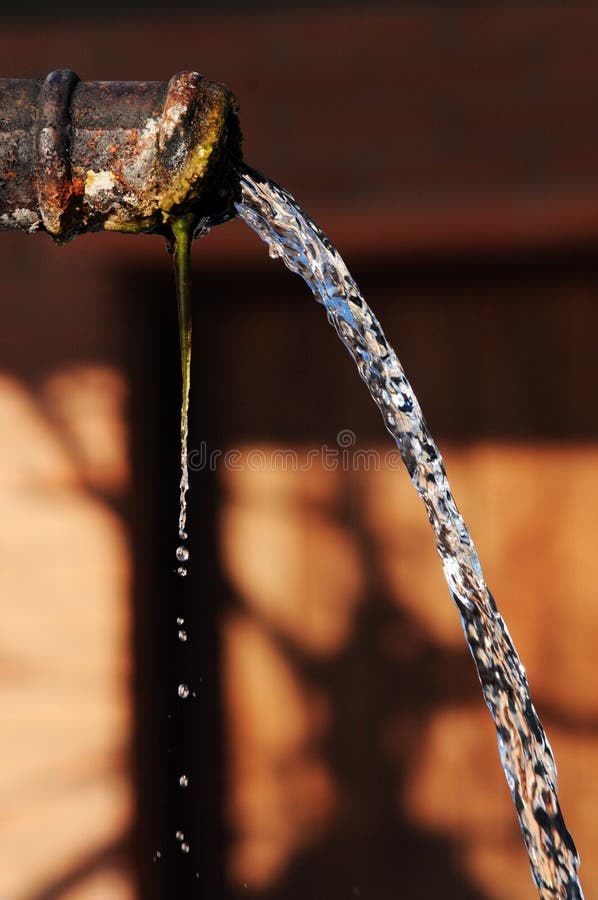 Water Trough Spout with Running Water Stock Image - Image of green ...