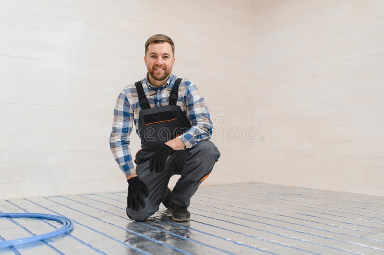 Water Underfloor Heating Systems Installation, Work in Progress on Construction Site for a ...