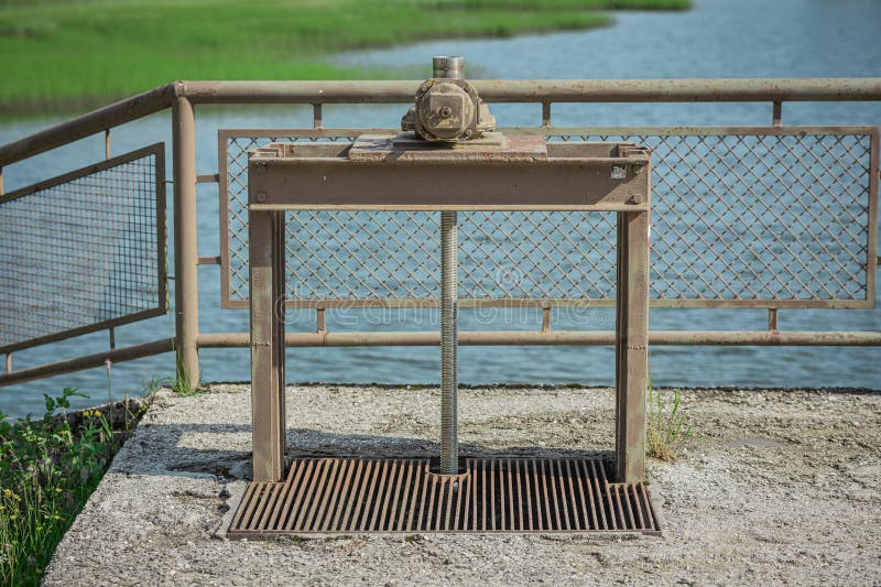 Water Valve on a Dam with Water, To Set the Overflow Value for the ...