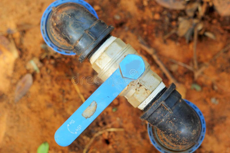 Water valve on the ground stock photo. Image of controller - 45369414