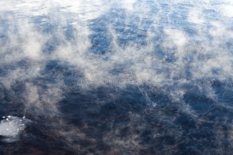 Water Vapor on Surface of Cold Water Stock Photo - Image of freezing ...