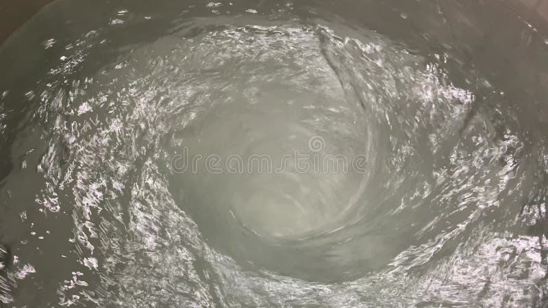 A Water Vortex is Generated by a Machine in a Container Stock Video ...