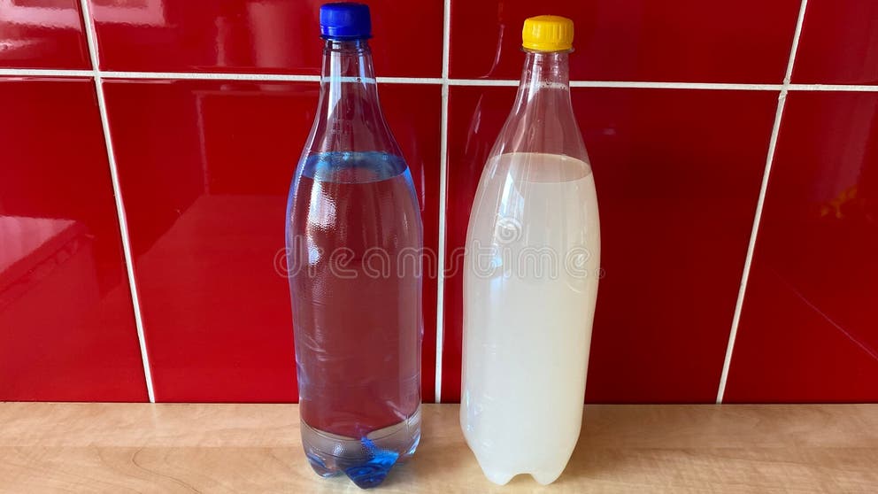 Water vs juice stock photo. Image of water, bottle, alcohol - 228834236