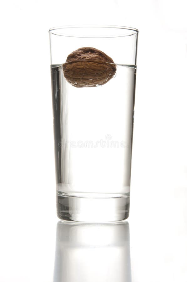 Water and walnut stock image. Image of blend, glass, stirred - 10476563