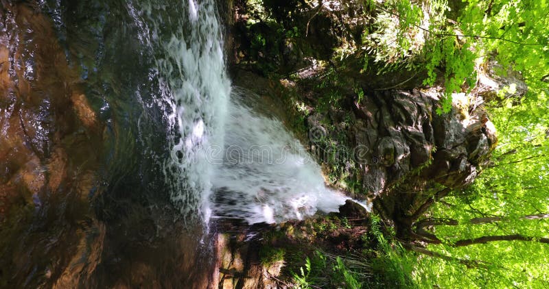 Water of Waterfall Goes in Blue Pool and Flowing Stream Stock Footage ...