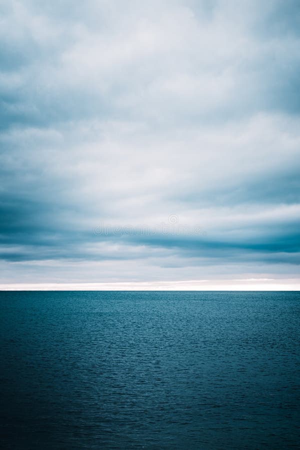 Water Waves on Cloudy Sky Background Stock Photo - Image of blue, waves ...