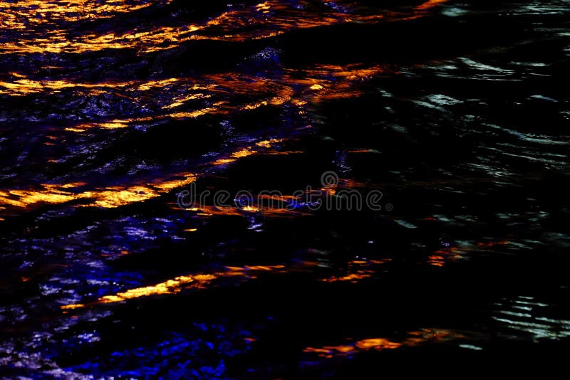 Blurred Colorful Lights Reflection on River Surface Stock Image - Image ...