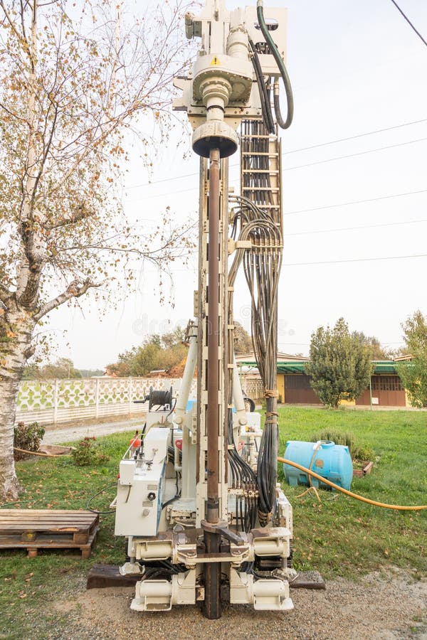 Water Well Drill. Industrial Machinery Drilling with Mining Tower Editorial Photo - Image of ...