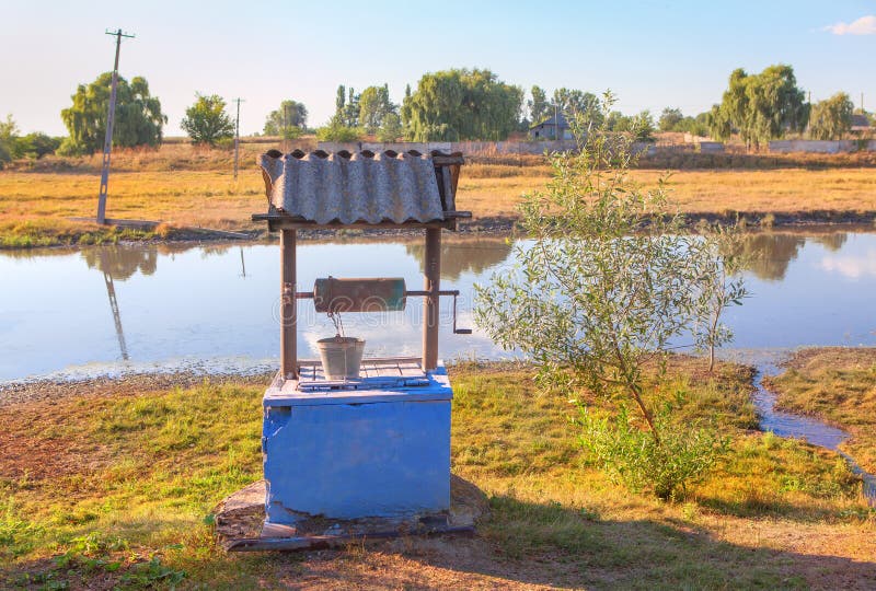 Water Well on the River Shore Stock Photo - Image of lake, landscape ...