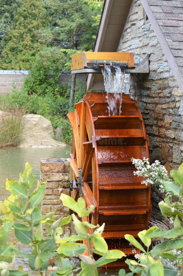A Water Wheel on a Building Stock Image - Image of backdrop, color ...