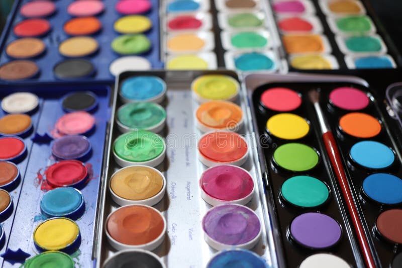 Watercolors in boxes stock image. Image of purple, concept - 320246325