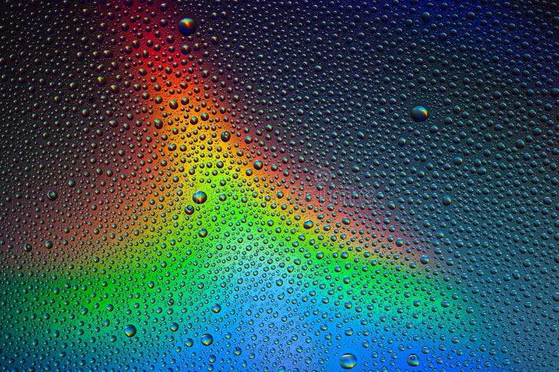 Waterdrops on Rainbow Coloured Parasol Stock Photo - Image of hues ...