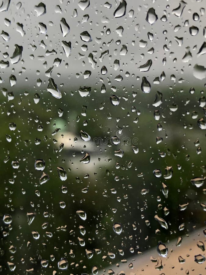Waterdrops on a window. stock image. Image of colors - 148265409