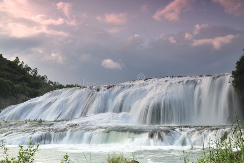 Idyllic waterfall stock image. Image of blue, daytime - 24057331