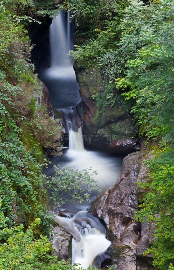 Idyllic waterfall stock image. Image of blue, daytime - 24057331