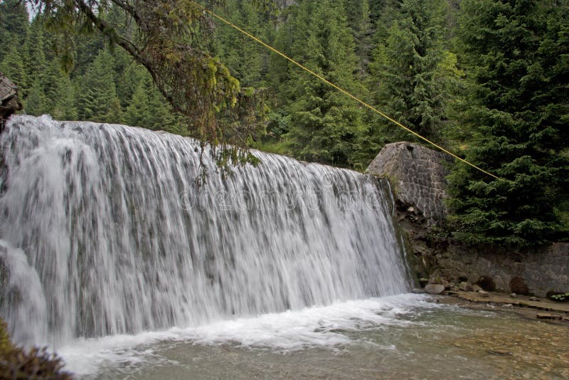 Created Waterfall and a Cable Over it Stock Photo - Image of fall ...