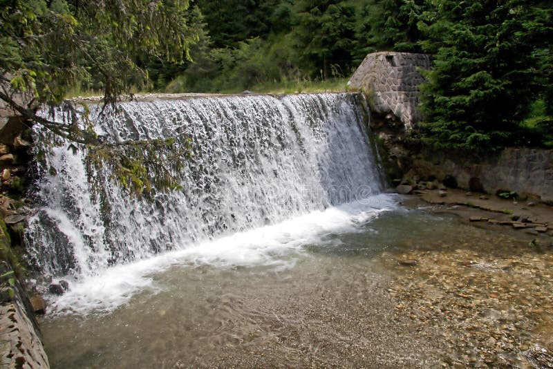 Created Waterfall and a Cable Over it Stock Photo - Image of cascade ...