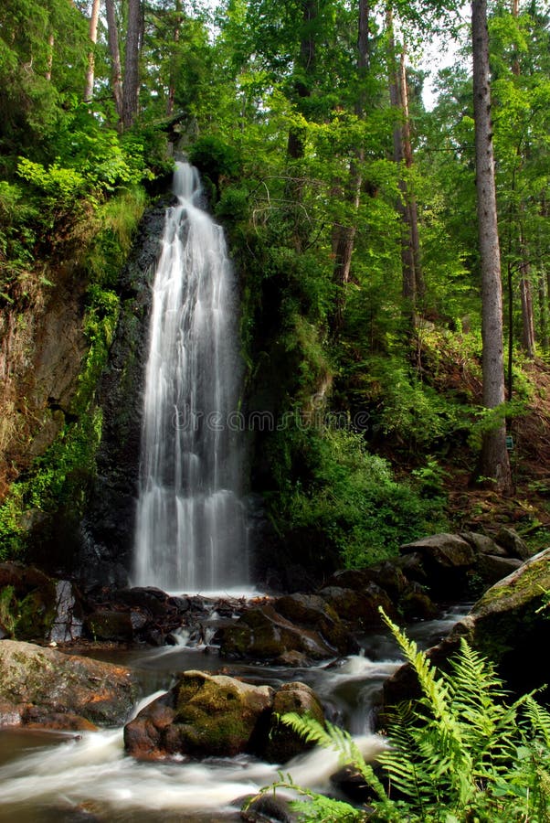 Stunning Waterfall Flowing Over Rocks in Forest Stock Image - Image of ...