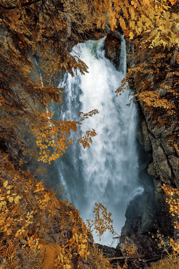 Waterfall in Autumn stock image. Image of waterfall, fall - 68465309