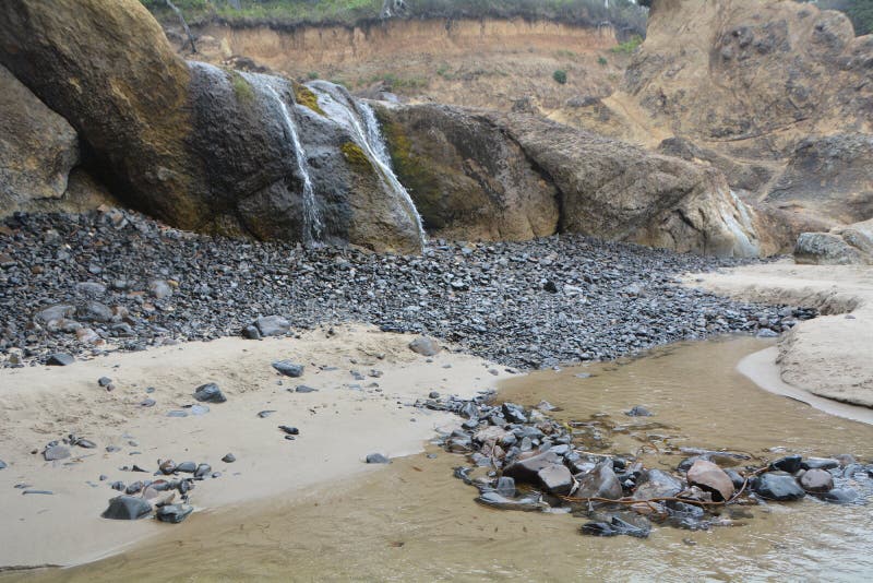Waterfall and Beach at Hug Point, Oregon Coast Stock Image - Image of ...