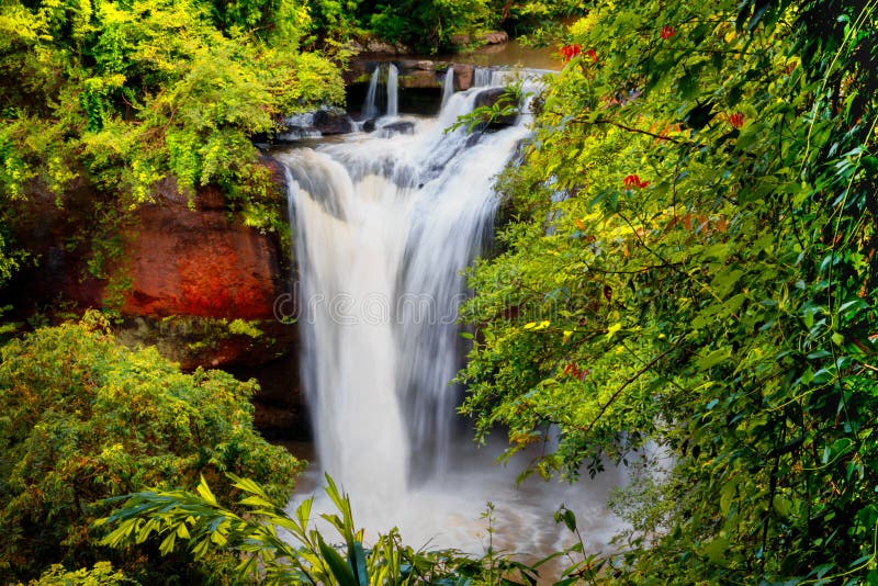 Waterfall In Greenery With Vibrant Water And Wet Paved Mosaic Road ...