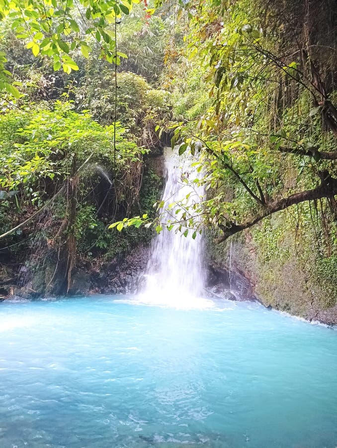 The Waterfall is Blue and the Scenery is Very Beautiful Stock Photo ...