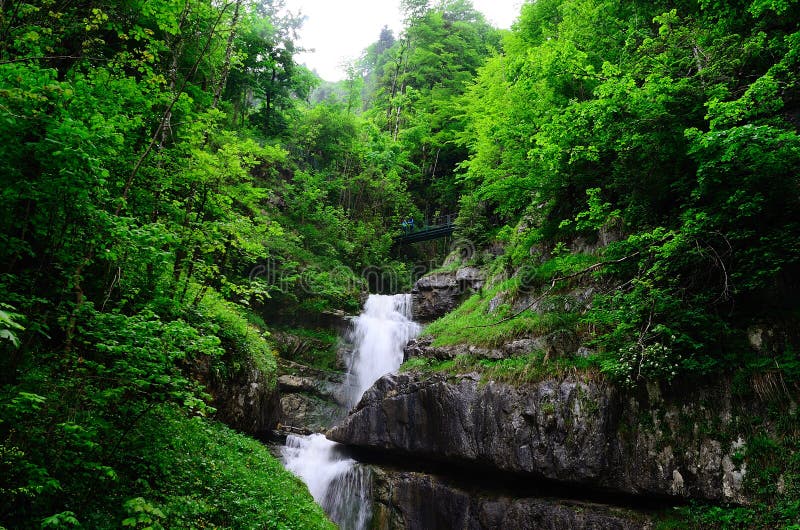 Waterfall and bridge stock photo. Image of liquid, energy - 56950074