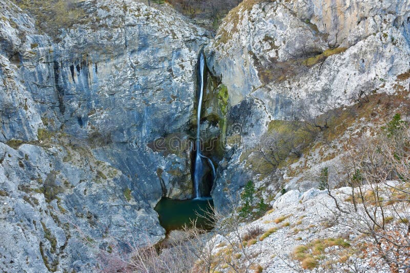Waterfall Carved into a Rock Wall Falling into a Pool in Val Rosandra ...