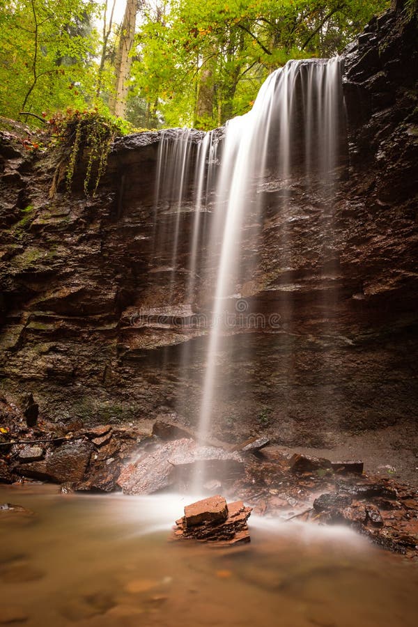 Cascade Waterfall Over a Rock Scene Stock Image - Image of circle ...