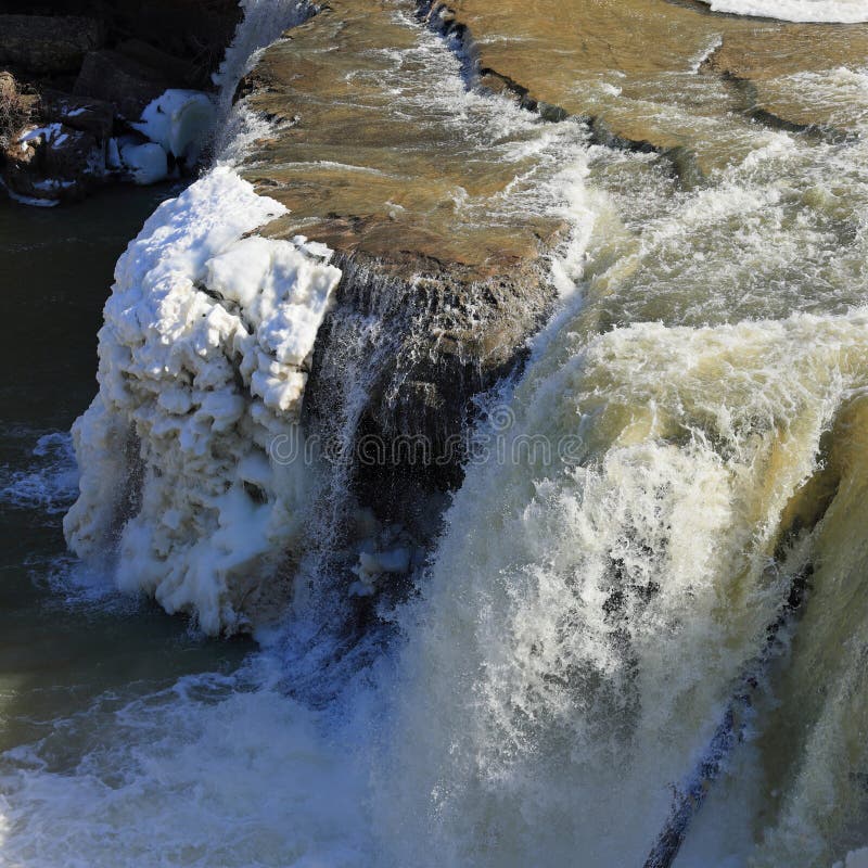 Waterfall Cascade on a Small River with Ice Stock Photo - Image of ...