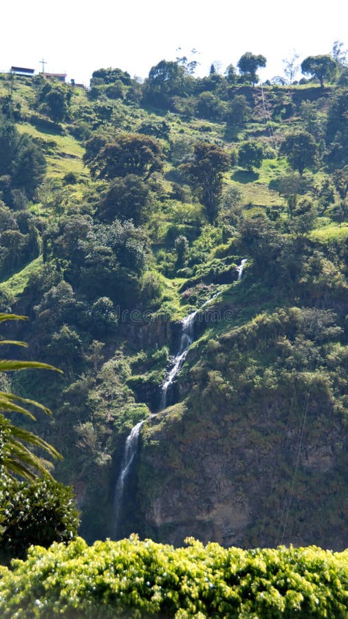 Waterfall Cascading Down a Mountain Stock Image - Image of eucador ...