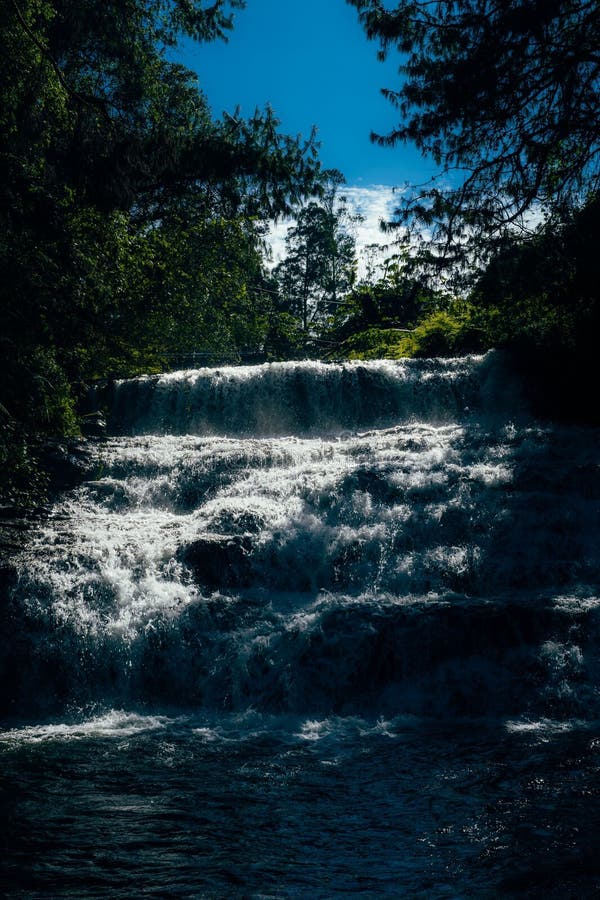 Waterfall Cascading Down Rocks Stock Photo - Image of wilderness ...