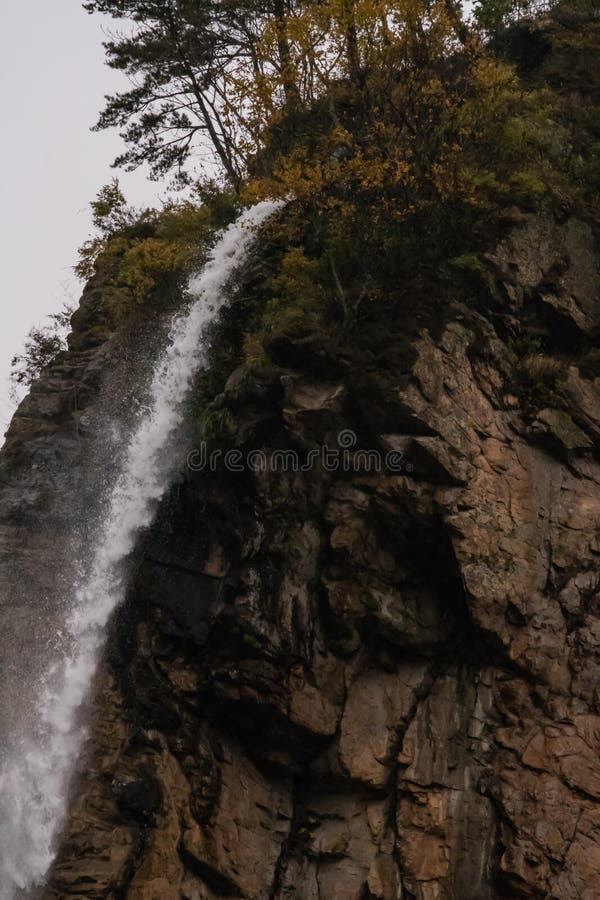 Waterfall Cascading Over a Rocky Ledge Stock Image - Image of ...