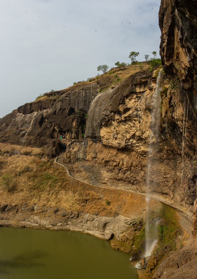 Waterfall and Caves at an Ancient Rock-Cut Site Stock Image - Image of ...