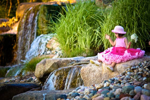 Waterfall and a child stock photo. Image of flora, girl - 5875792