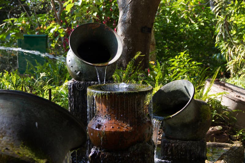 Waterfall pottery garden stock image. Image of water, decor - 1851431