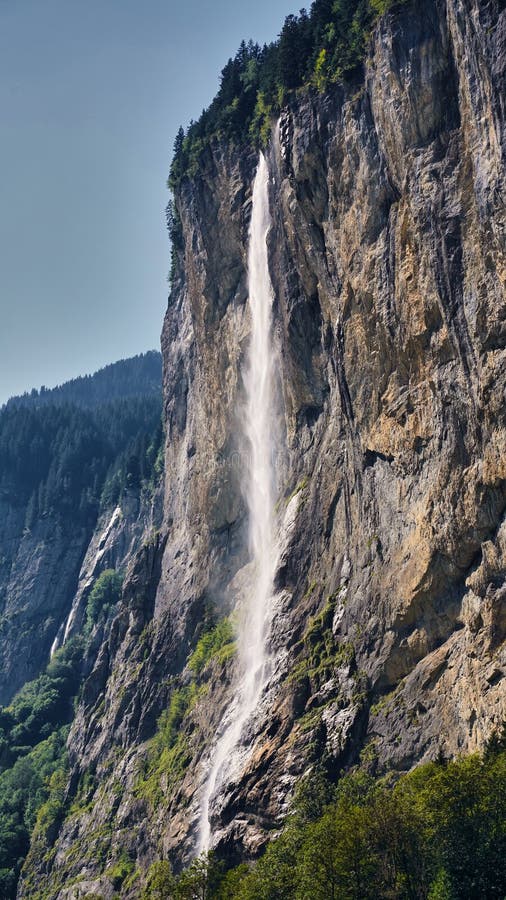 Waterfall on a cliff stock image. Image of purity, flow - 295071811