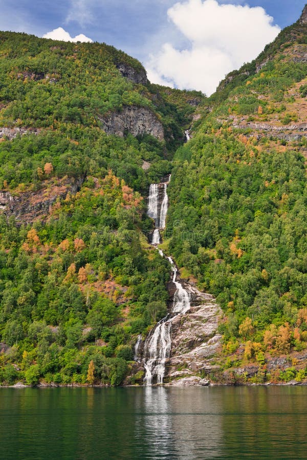 Waterfall and Cliff in Geiranger Fjord Stock Image - Image of biome ...