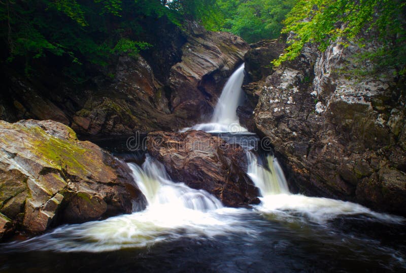 Waterfall in countryside stock image. Image of blur, greenery - 20711433